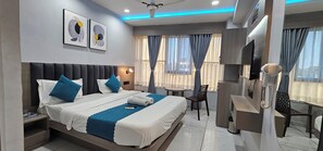 Quarto casal luxo, vista para a cidade