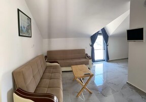 Apartamento standard | Wi-Fi de cortesia, roupa de cama