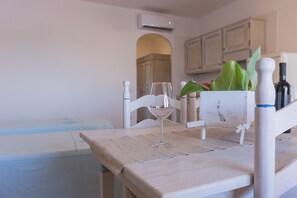 Apartamento, 1 quarto | Sala de jantar