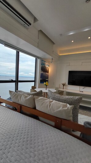 Quarto casal luxo, cozinha, vista para a praia | Parte interna