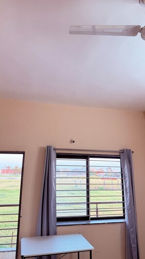 Quarto Duplo Deluxe, vista para o pátio | Interior