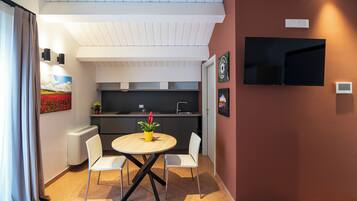 Quarto casal, vista para a cidade | Opções para refeição