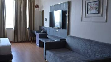 Quarto Duplo Superior, pátio | Sala de estar