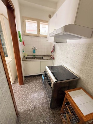 Apartamento, 3 quartos | Cozinha privada