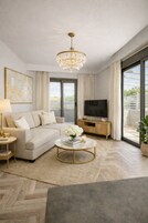 Apartamento luxo, vista para o jardim | Área de estar