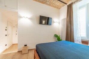 Quarto Clássico com Cama de Casal, Vista para a cidade | Quartos insonorizados 