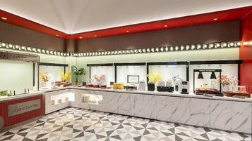 Um hall de hotel moderno com piso de mármore, balcão de recepção e uma parede com detalhes em vermelho.