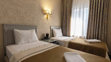Quarto Standard | Roupa de alta qualidade, minibar com produtos grátis