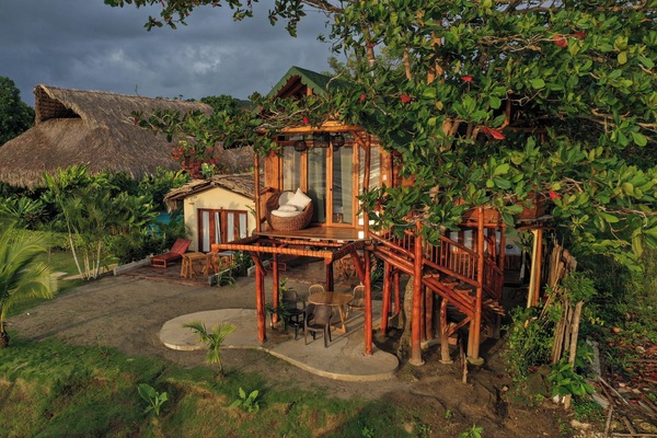 Casa na árvore, vista para o mar | Roupa de cama