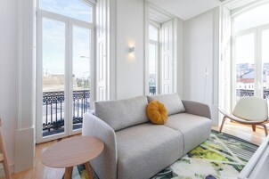 Apartamento Deluxe, Vista para a cidade | Sala de estar