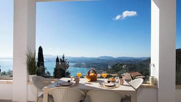 Apartamento Comfort, vista para o mar | Refeições ao ar livre