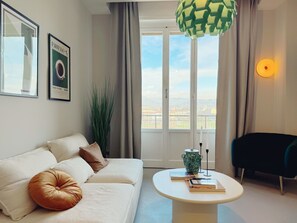 Apartamento, 2 quartos | Sala de estar