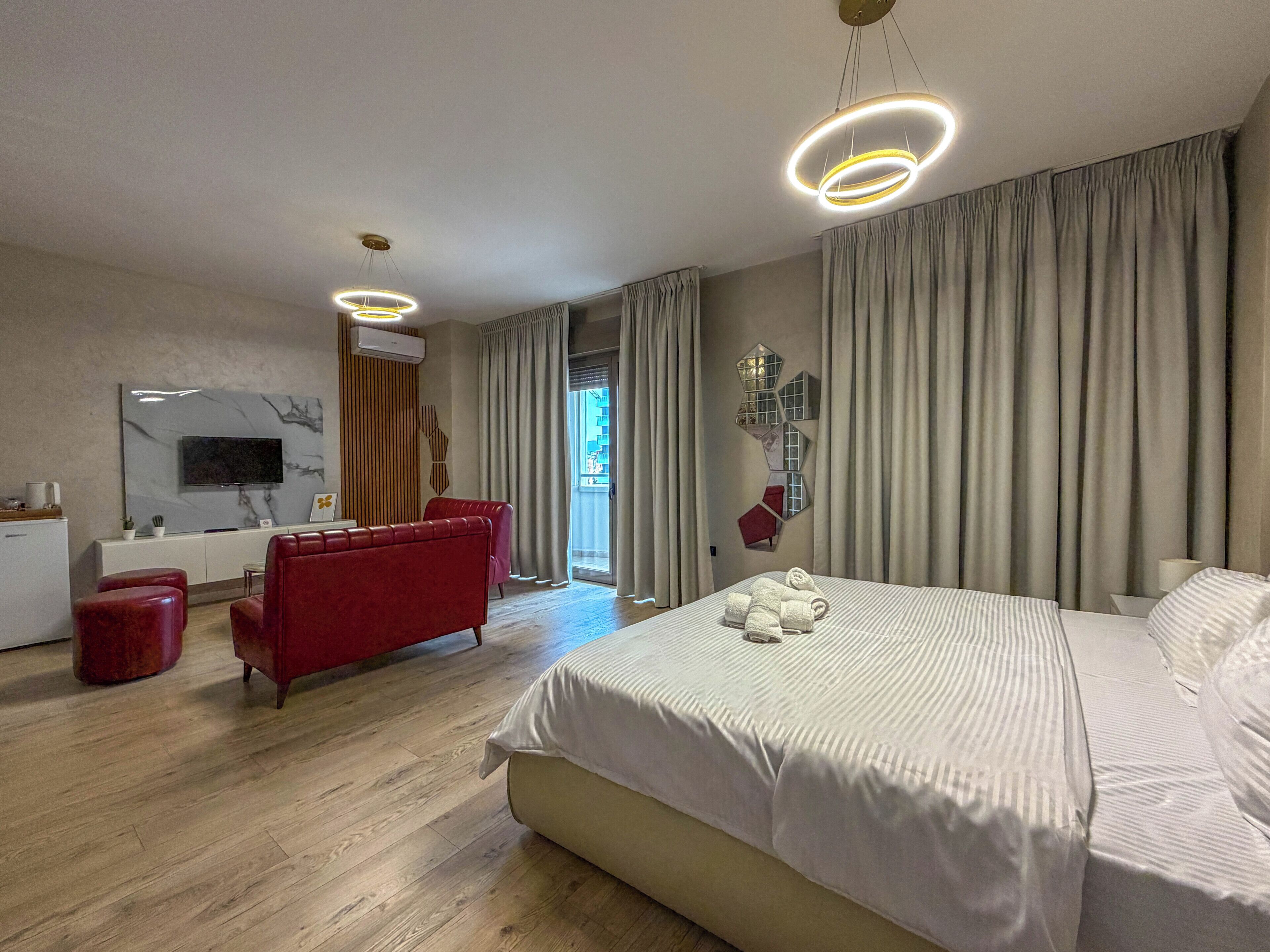 Quarto casal, sacada, vista para a cidade