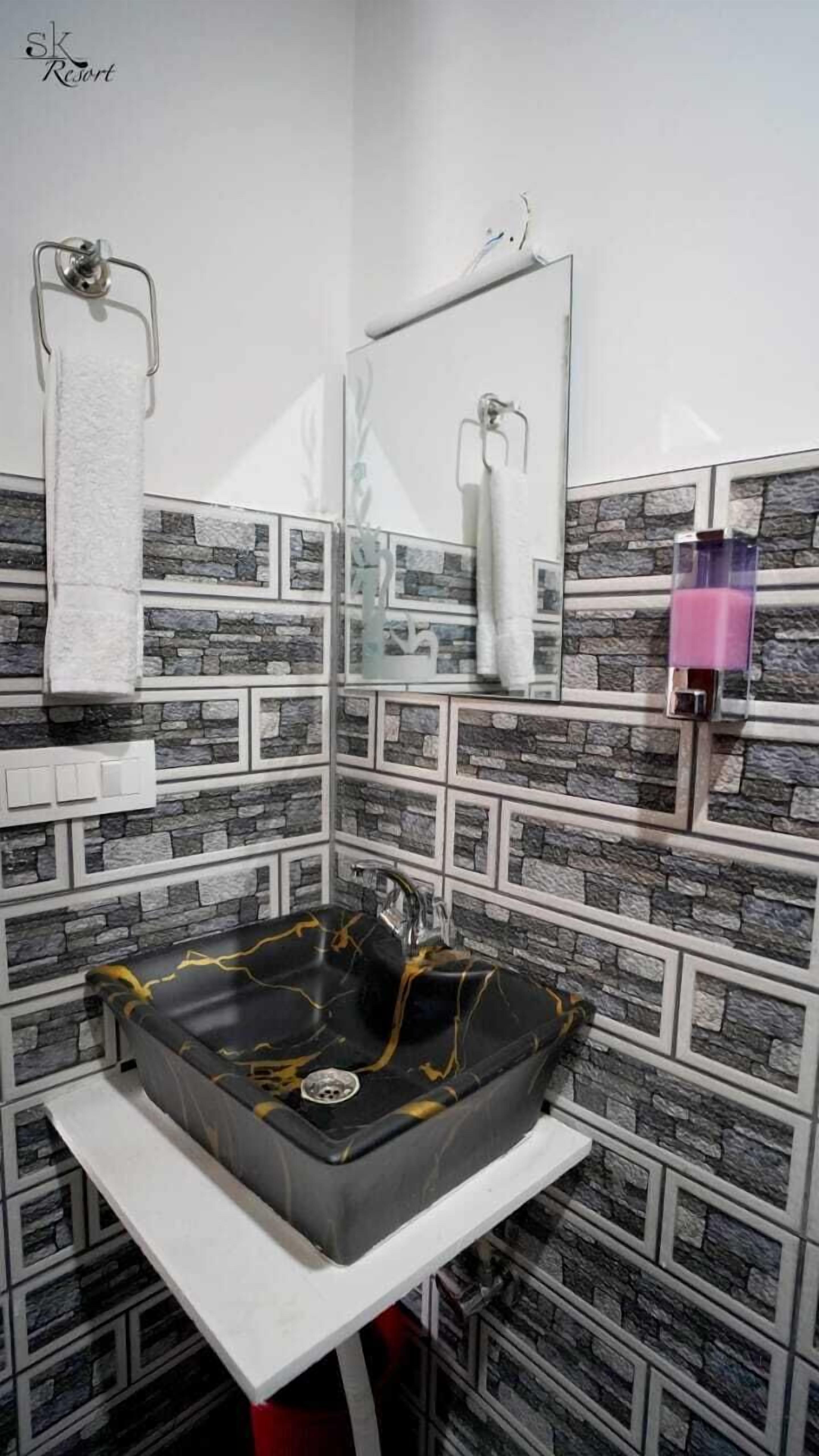 Quarto Duplo ou Twin Deluxe, pátio, vista para a montanha | Casa de banho