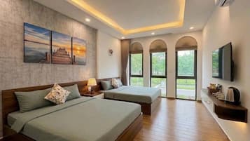 Quarto quádruplo standard, vista para a cidade | Cortinas blackout, quartos à prova de som, ferros/tábuas de passar roupa
