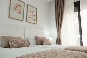 Quarto Duplo Deluxe, Vista para a cidade | Wi-fi grátis 