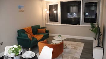 Apartamento, 2 quartos, lareira | Sala de estar