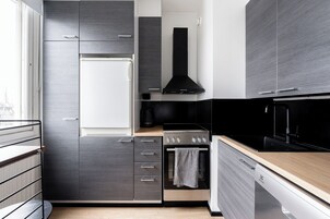 Apartamento, Vista para a cidade | Cozinha privada