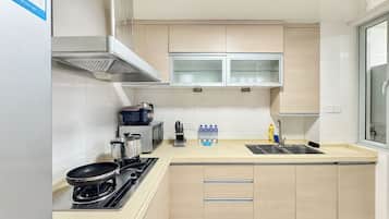 Suíte superior, vista para a cidade | Cozinha privada