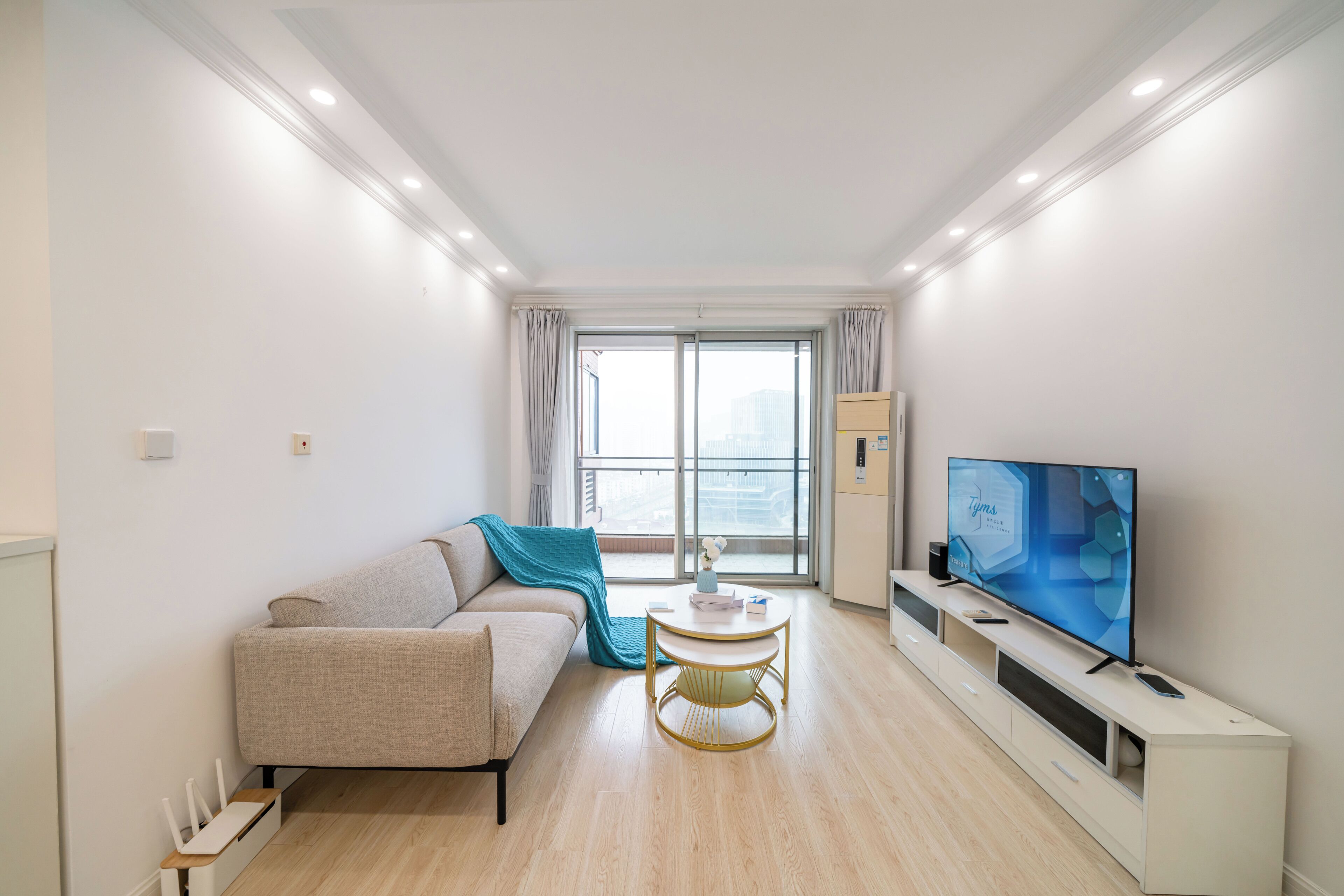 Suíte superior, várias camas, para não fumantes, vista para a cidade | Sala de estar