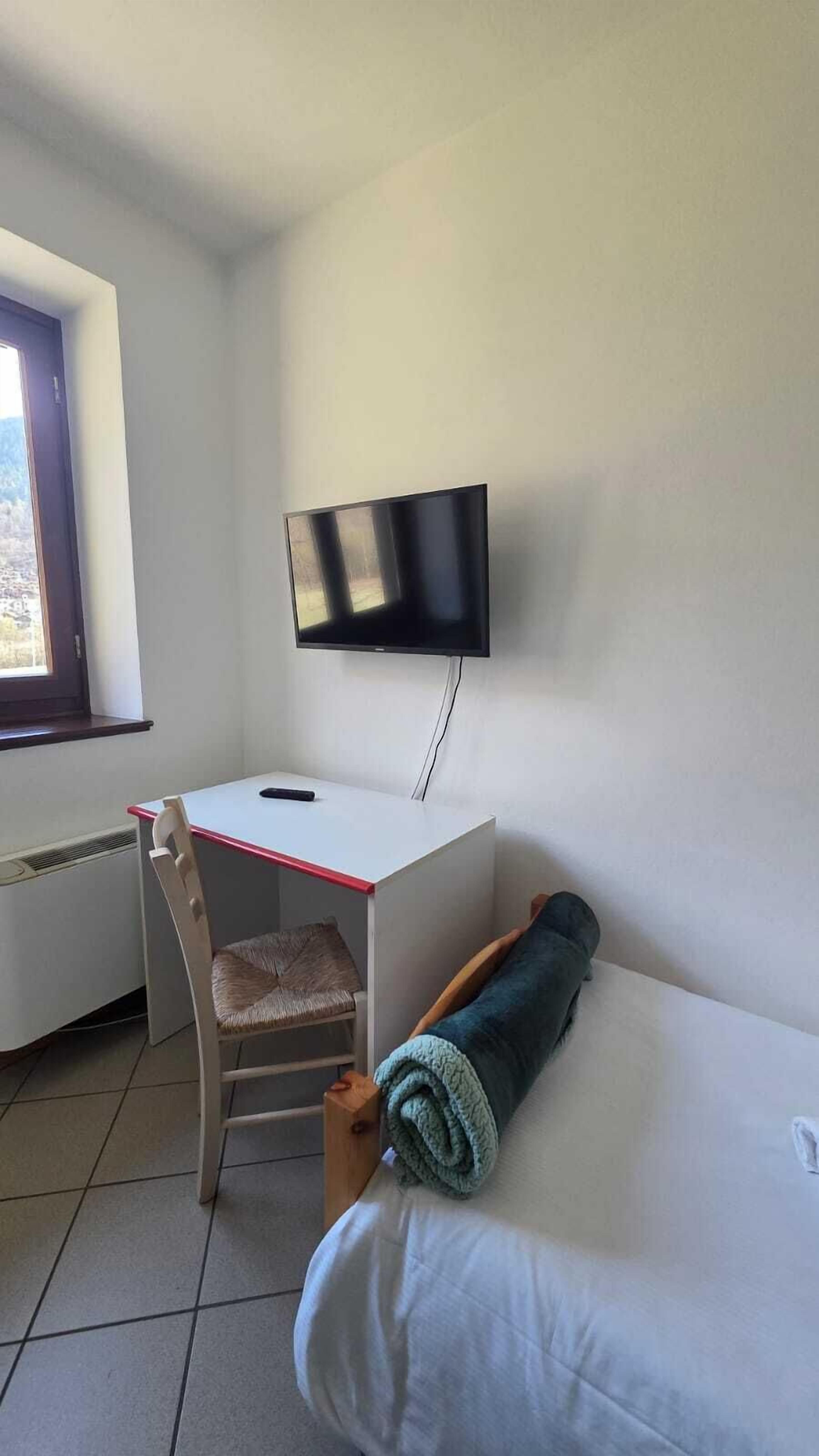 Quarto solteiro clássico, vista para a montanha