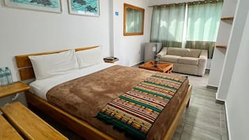 Quarto Duplo Deluxe | Sala de estar