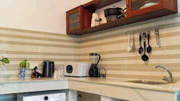 Villa Familiar, varanda, vista para o jardim | Cozinha privada