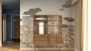 Quarto com armário de madeira, parede estampada e piso em padrão herringbone.