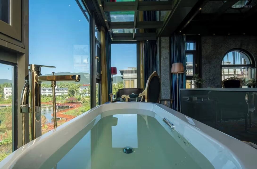 Quarto Duplo Comfort, vista para o jardim | Casa de banho