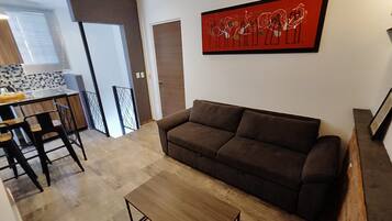 Apartamento Comfort, Vista para a cidade | Sala de estar