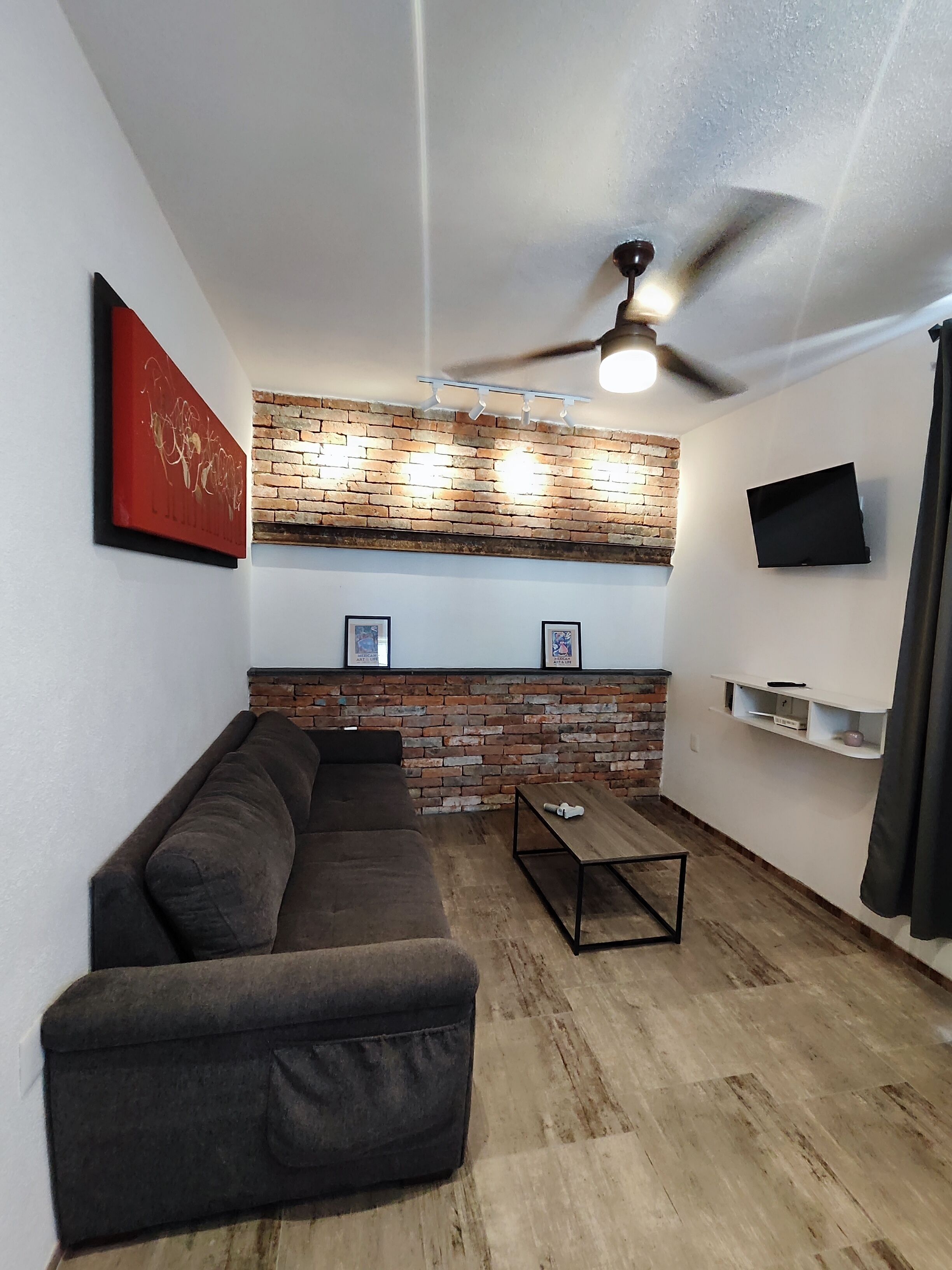 Apartamento Comfort, Vista para a cidade | Sala de estar