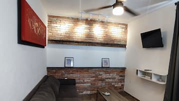 Apartamento Comfort, Vista para a cidade | Sala de estar