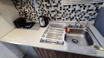 Apartamento Comfort, Vista para a cidade | Cozinha privada