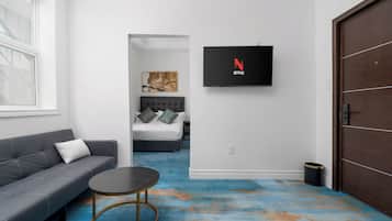 Suite Executiva | Sala de estar | Smart TV de 43 polegadas com canais digitais, Netflix
