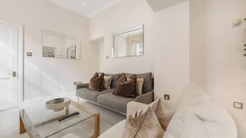 Apartamento Deluxe | Sala de estar