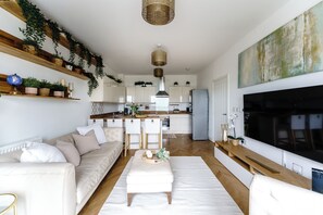 Apartamento Comfort, vista para o rio | Sala de estar