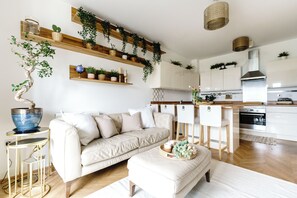 Apartamento Comfort, vista para o rio | Sala de estar