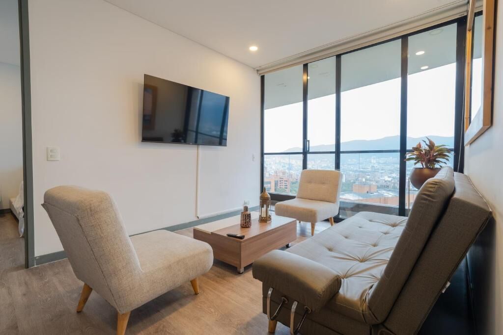 Apartamento, vista para a cidade | Área de estar