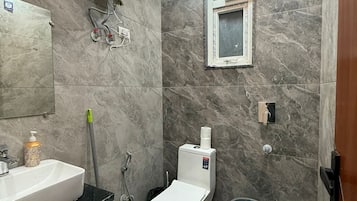 Quarto Deluxe, Vista para a cidade | Casa de banho