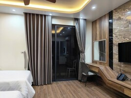 Quarto Duplo ou Twin Deluxe, vista para o jardim