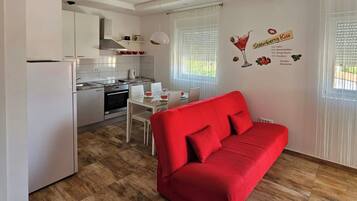 Apartamento Standard, vários quartos (Sun And Fun) | Sala de estar | TV de ecrã plano