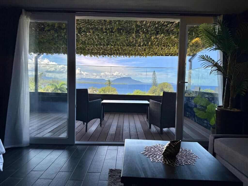 Quarto de Luxo, varanda, vista para o oceano | Sala de estar