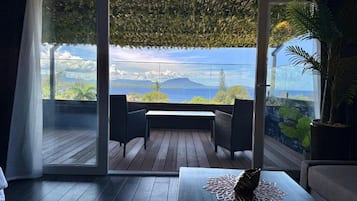 Quarto de Luxo, varanda, vista para o oceano | Sala de estar