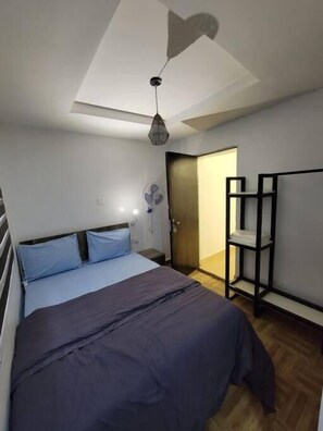 Apartamento, 2 quartos, ar condicionado | Cortinas/cortinados opacos, quartos insonorizados 