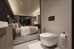 Quarto Duplo Deluxe, Vista para a cidade | Casa de banho
