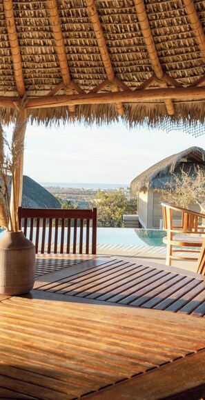 Cabana superluxo, vista para o oceano | Opções para refeição ao ar livre
