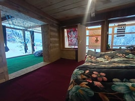 Quarto casal família, vista para a montanha