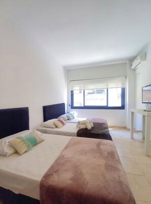Apartamento, 3 camas individuais | Wi-fi grátis 