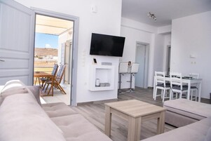 Casa Familiar, vista para o jardim | Sala de estar