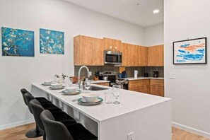 Apartamento, pátio | Cozinha privada